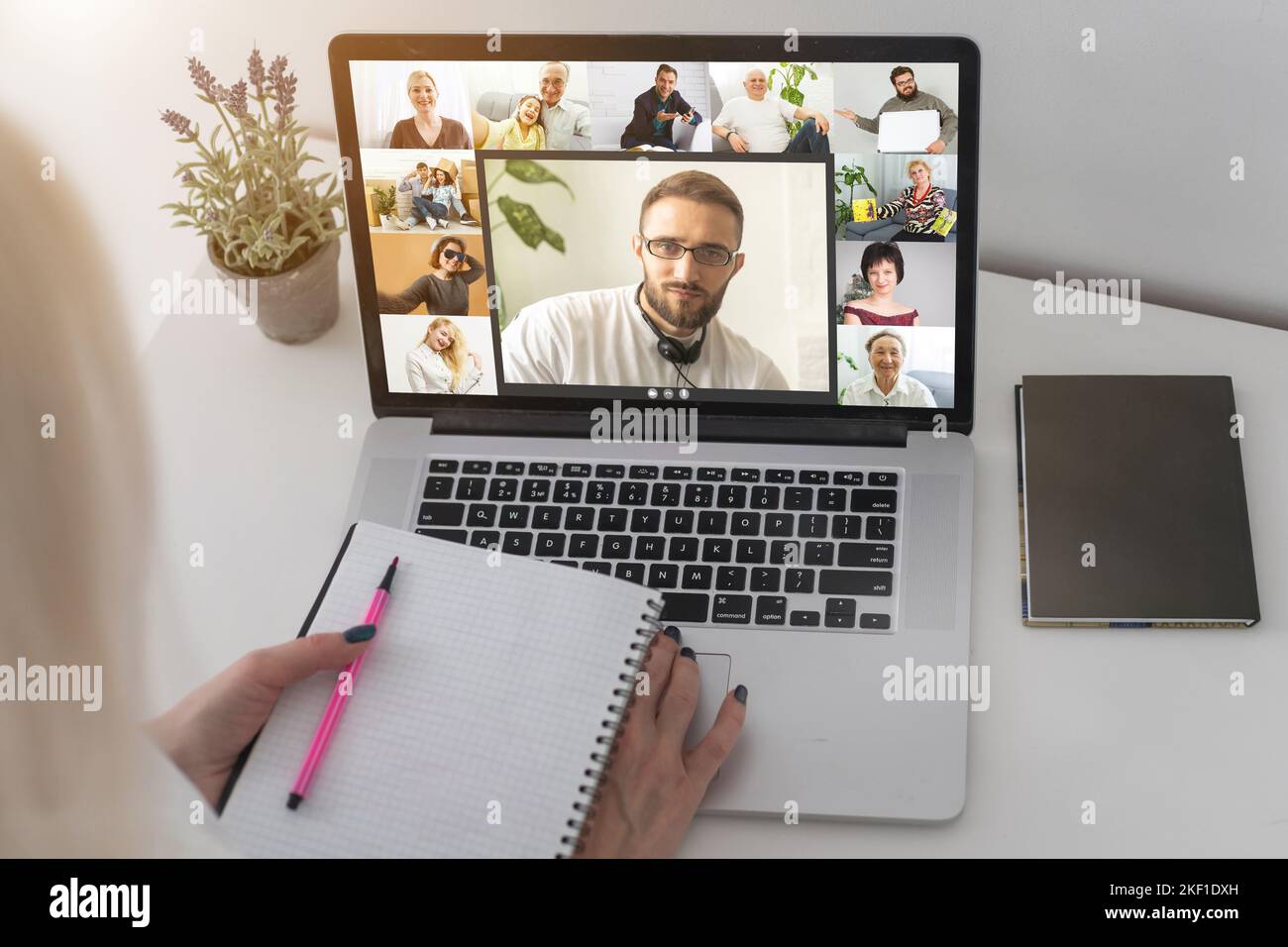 Back view of woman making video call with her doctor while staying at ...