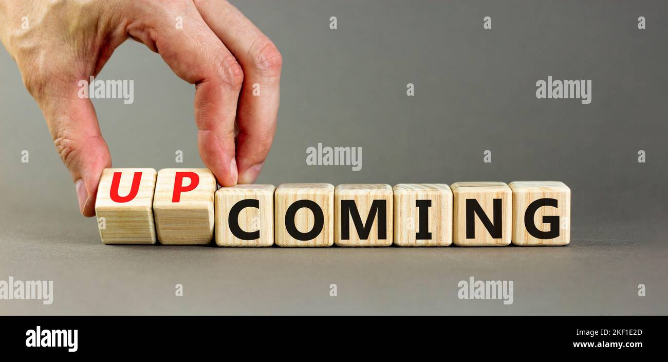 Coming or upcoming symbol. Concept words Coming and Upcoming on wooden ...