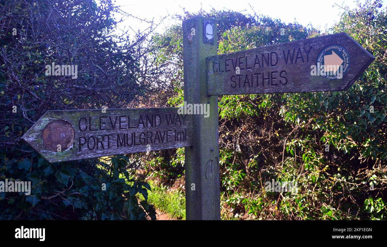 Wooden signpost on the Cleveland Way giving directions to the historic ...
