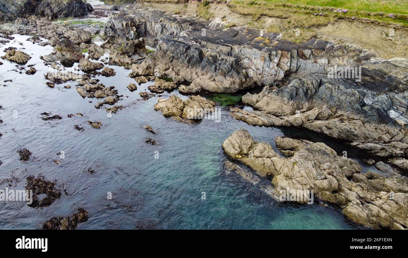 Coastal rocks under sea water, seascape. The coastline of the Atlantic ...