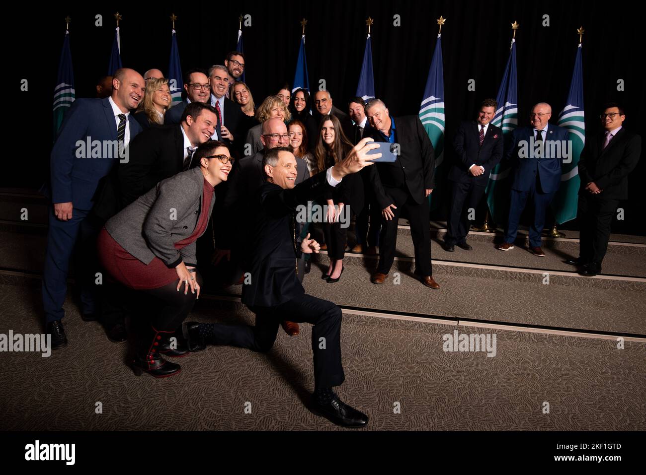 Ottawa Mayor Mark Sutcliffe, front, leads a group selfie with members ...