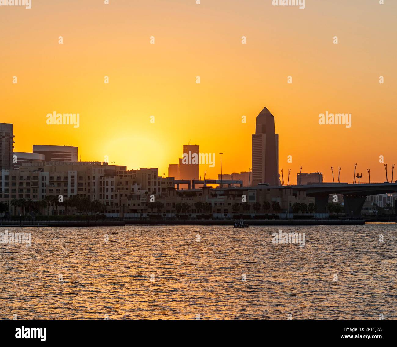 Dramatic sunset over a city skyline Stock Photo - Alamy