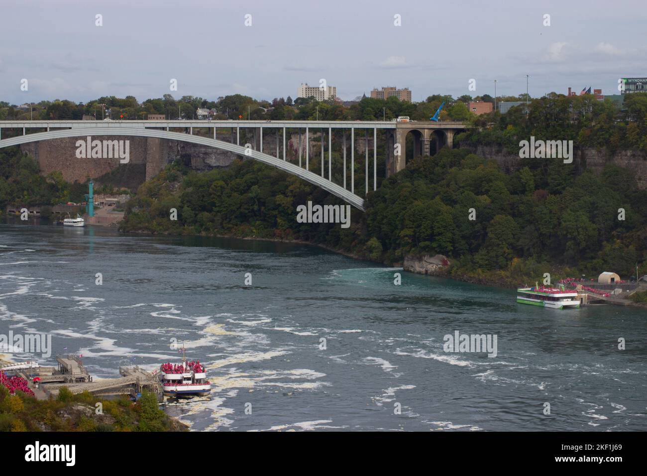 A low-angle of Rainbow International bridge over Niagara river, gloomy ...