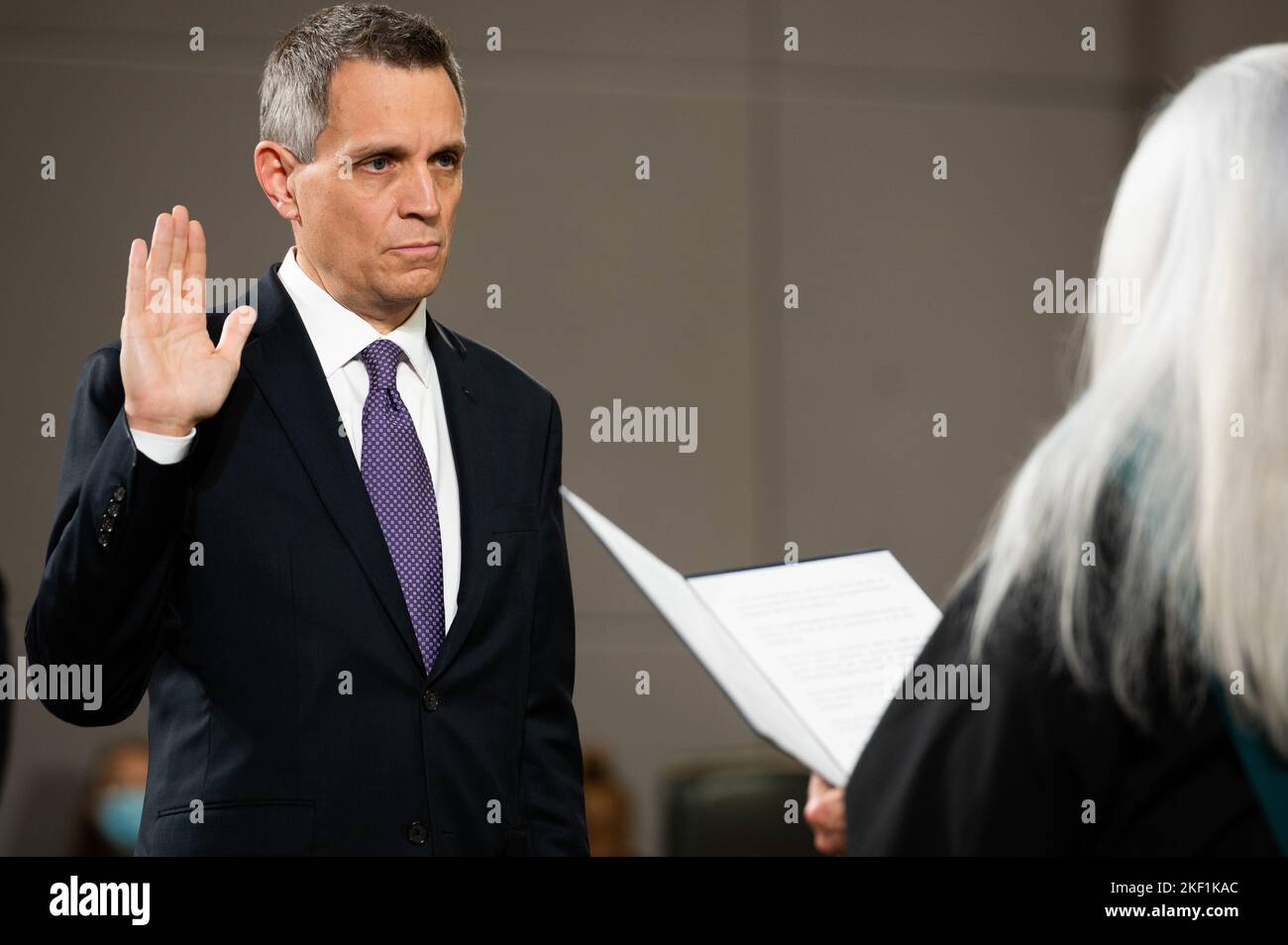 Ottawa Mayor Mark Sutcliffe, left, is sworn in by Justice of the Peace ...