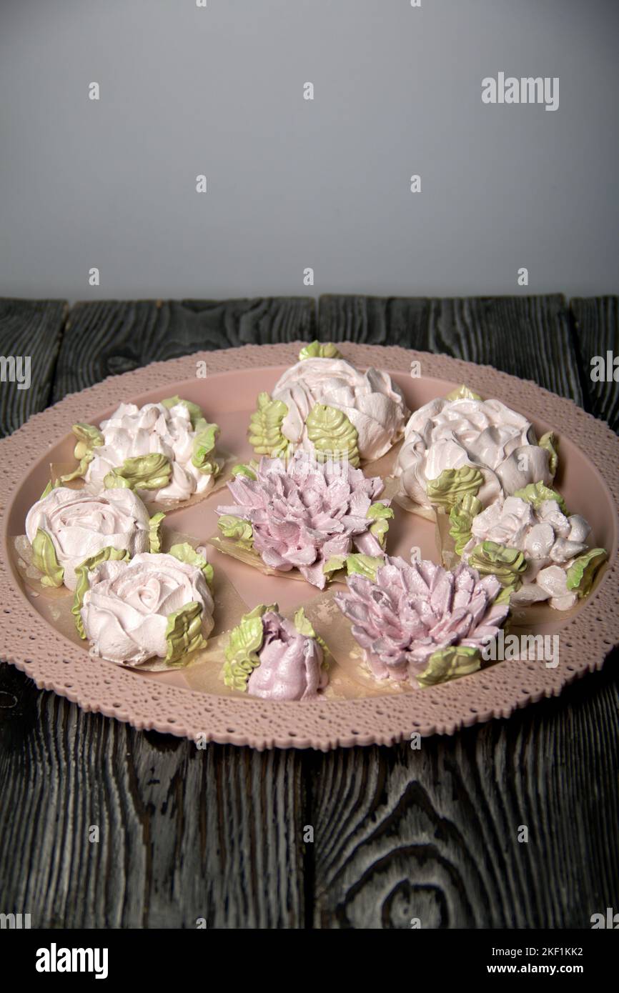 Marshmallow flowers on a tray. Marshmallow flower buds. Homemade sweets ...