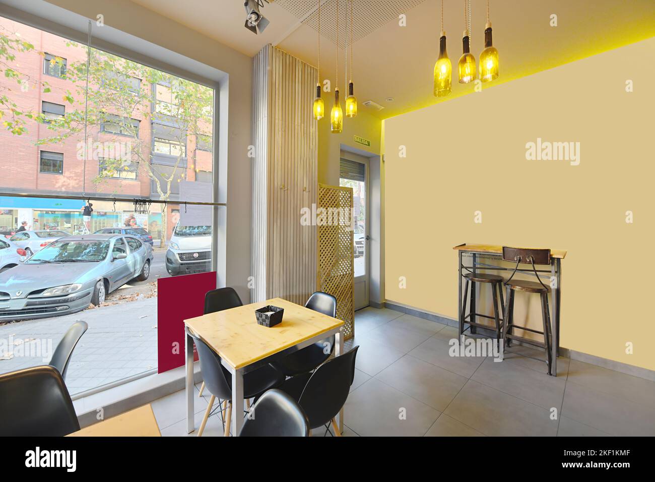 Lounge of a cafeteria with windows to the street Stock Photo - Alamy