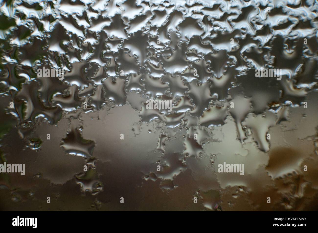 Close-up of condensation with water drops on the glass, texture of ...
