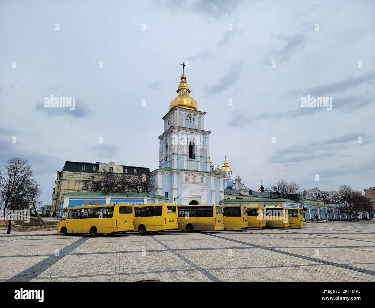 The yellow buses parked in empty Saint Michael's Square during Russian ...