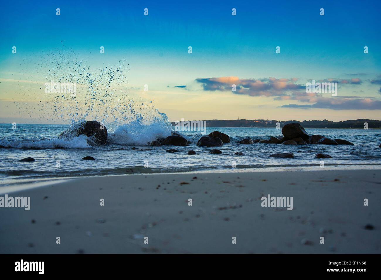 The mesmerizing Baltic sea splashing near the rocks at the beach on ...