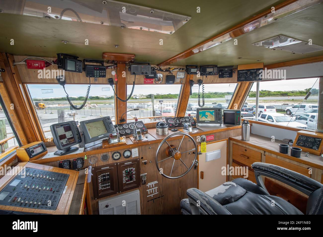 The wooden control panel of a modern ship Stock Photo - Alamy
