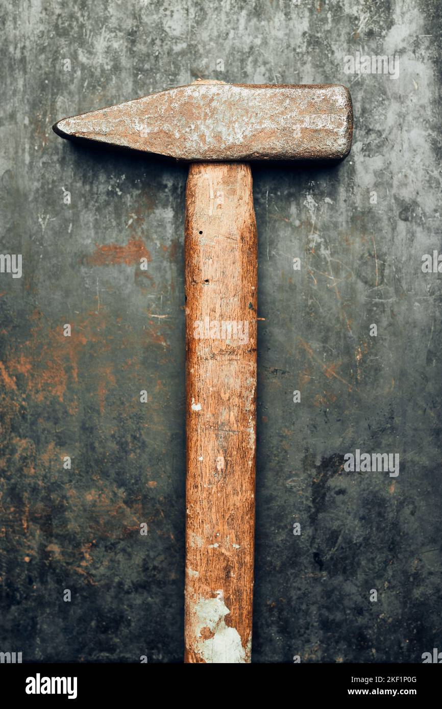 Old hammer on steel surface. Tool for maintenance. Hardware tool to fix ...