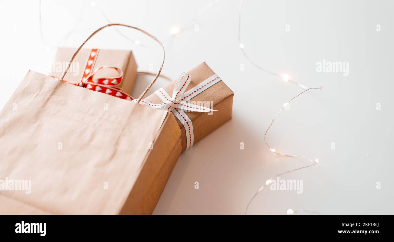 Woman holding paper boxes hi-res stock photography and images - Alamy