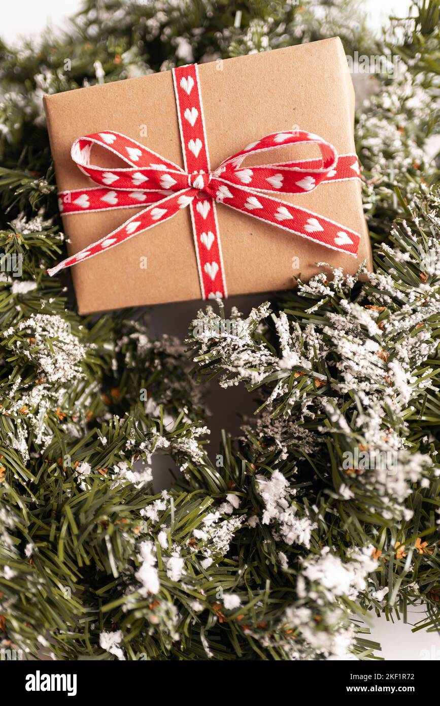 Gift wrapped craft paper on Christmas gift Stock Photo - Alamy