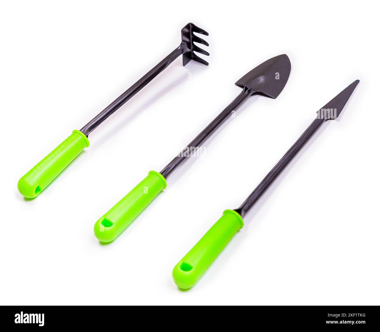 Garden tools for flowers on a white background Stock Photo - Alamy