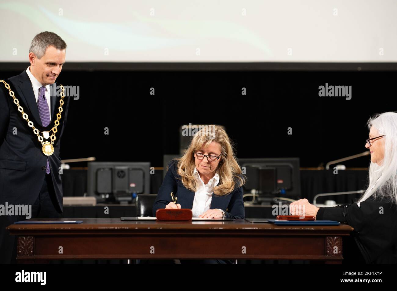 Ottawa City Councillor for Kanata North Ward Cathy Curry centre signs ...