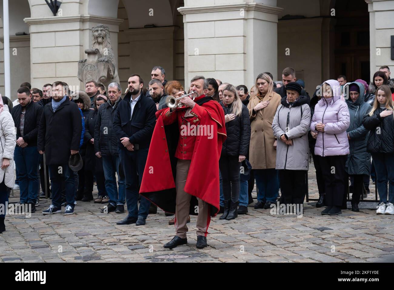 A man plays a trumpet while residents of Lviv paid tribute to Taiwanese ...