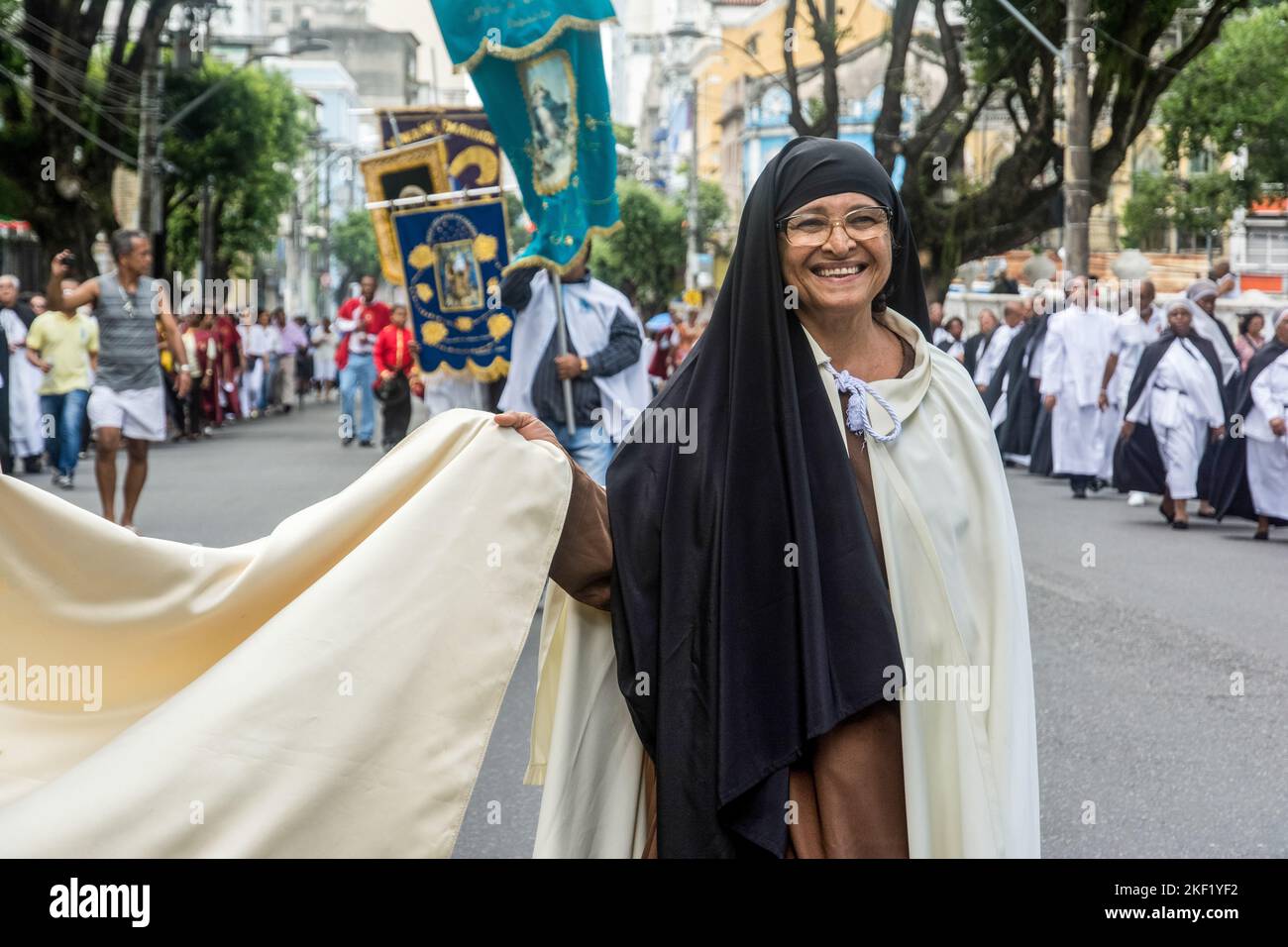 Salvador, Bahia, Brazil - May 26, 2016: Catholic members hold flags ...