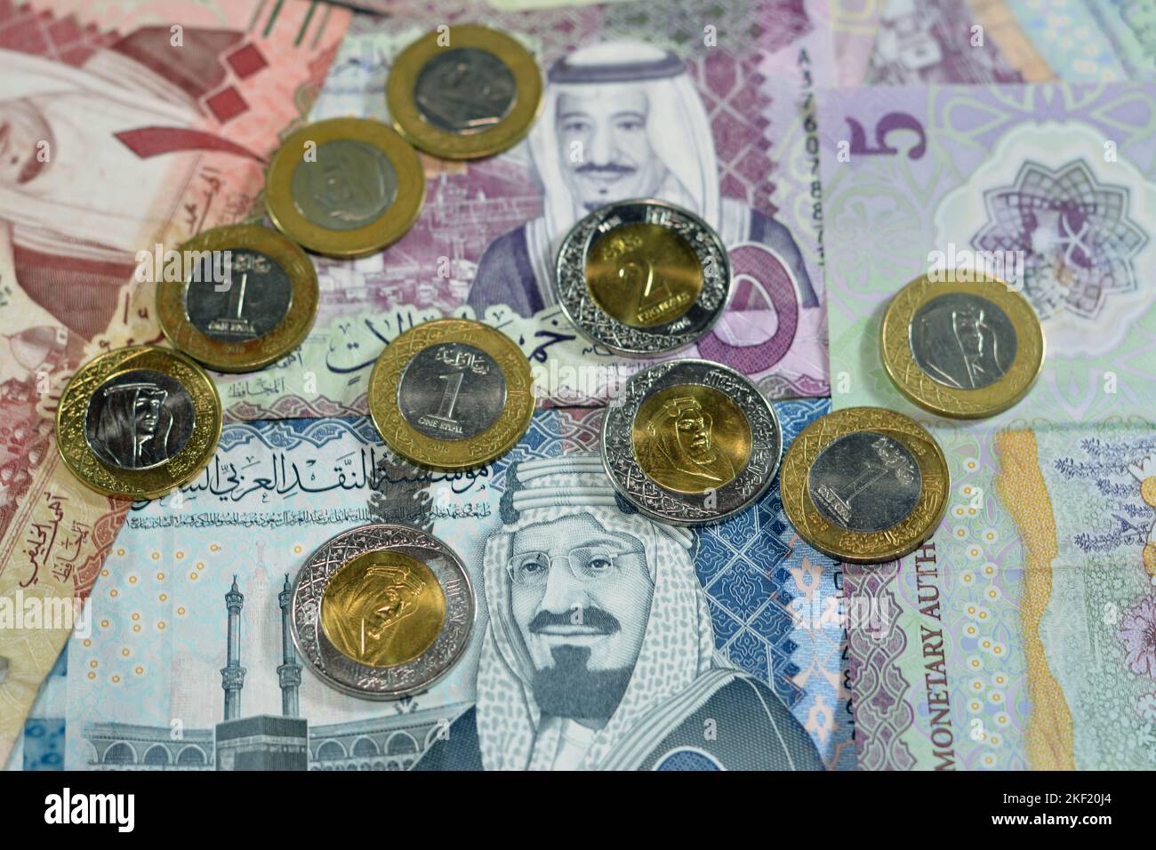 Saudi Arabia riyals money banknotes and coins, a pile of 500 SAR, 100 ...