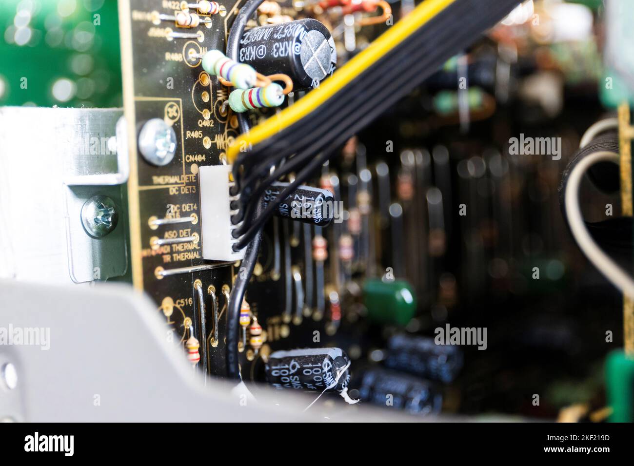 A portrait of a P connector connecting a few black and one yellow wire ...