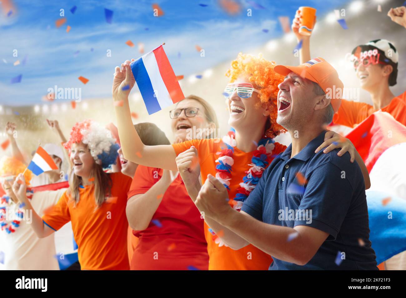 Netherlands football supporter on stadium. Dutch fans on soccer pitch ...
