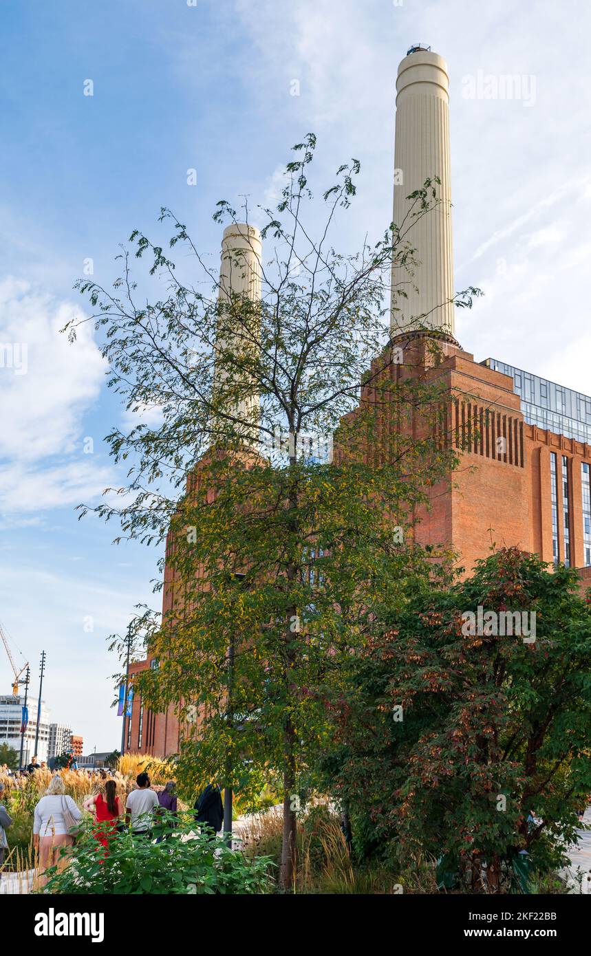 Crowd of people visiting iconic London landmark Battersea Power Station ...