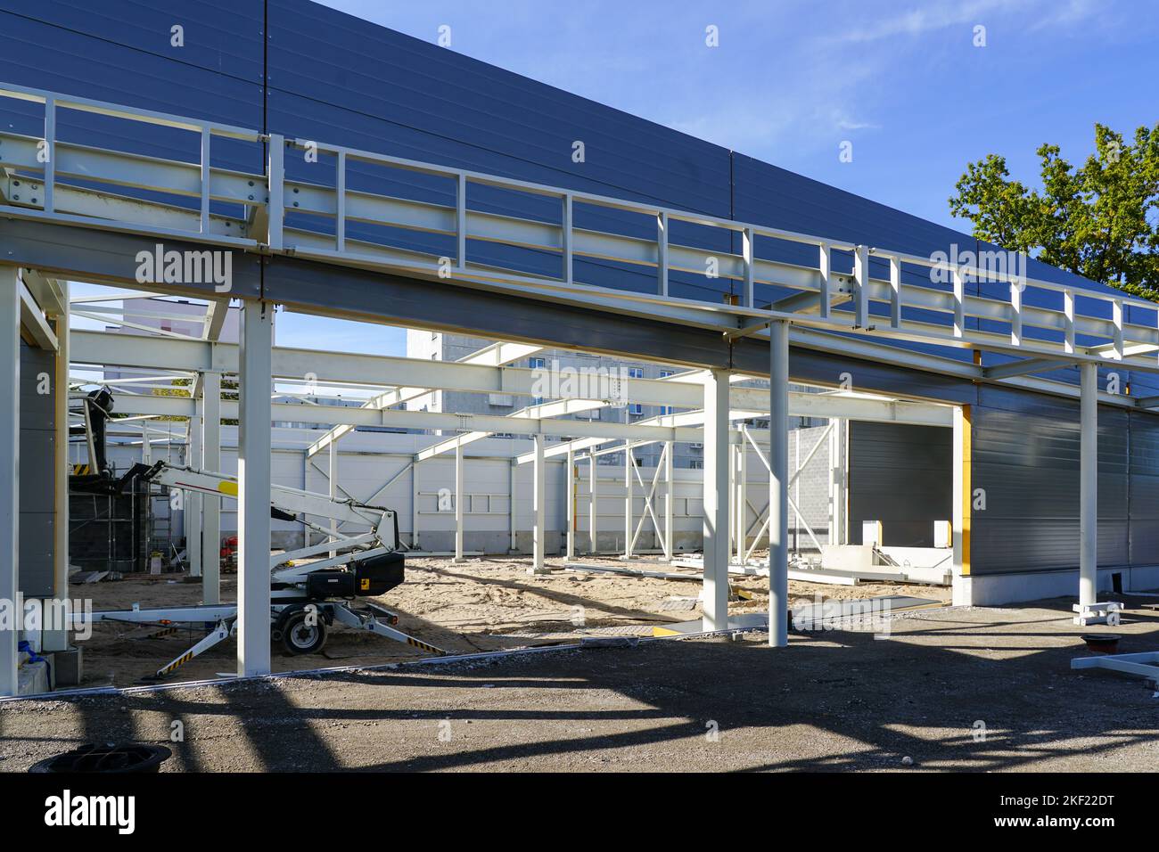 Unfinished white prefabricated steel construction frame of a new modern ...