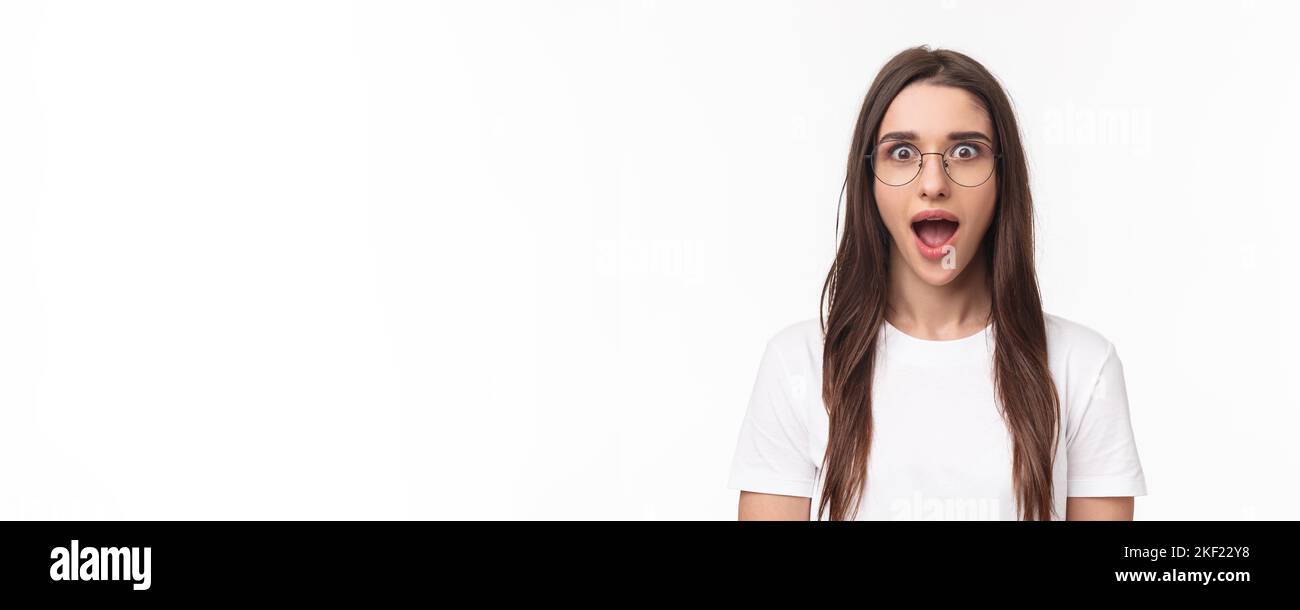 Close-up portrait of enthusiastic, intrigued young brunette woman ...