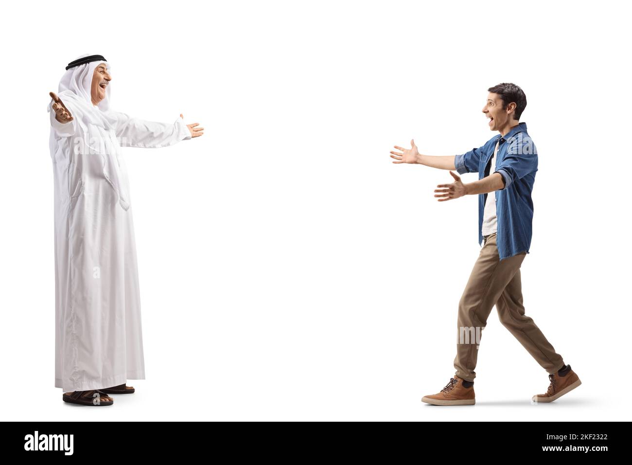 Full length profile shot of an mature arab man in a robe meeting a ...