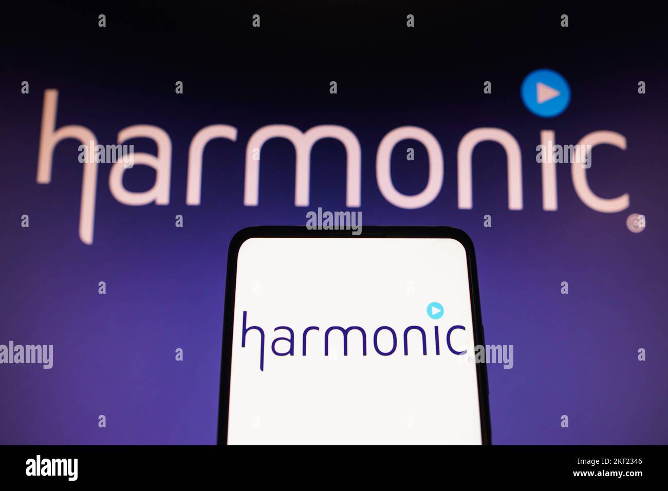 In this photo illustration, the Harmonic Inc. logo is displayed on a smartphone screen Stock ...