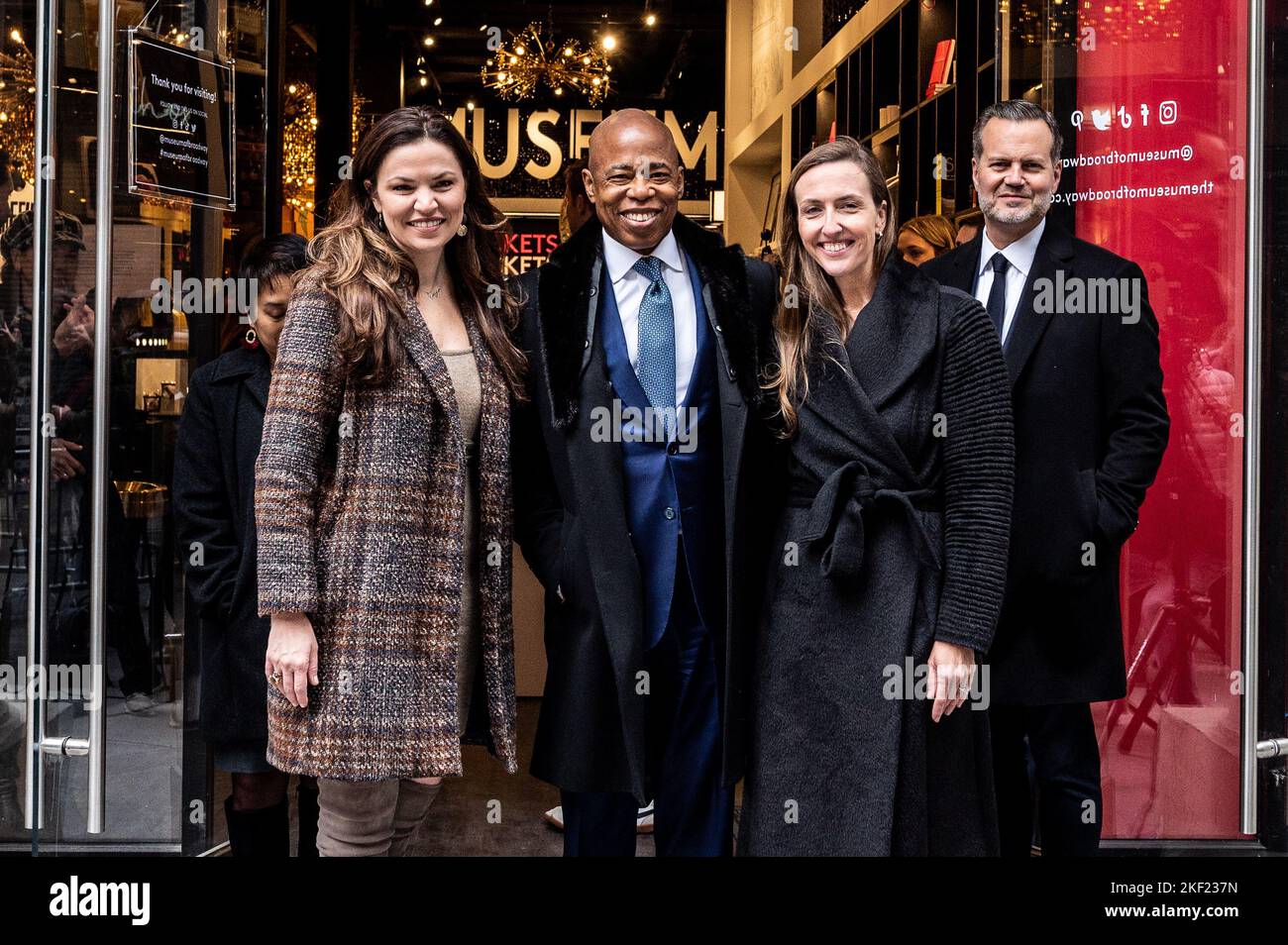New York City Mayor Eric Adams (D) standing with Julie Boardman (left ...