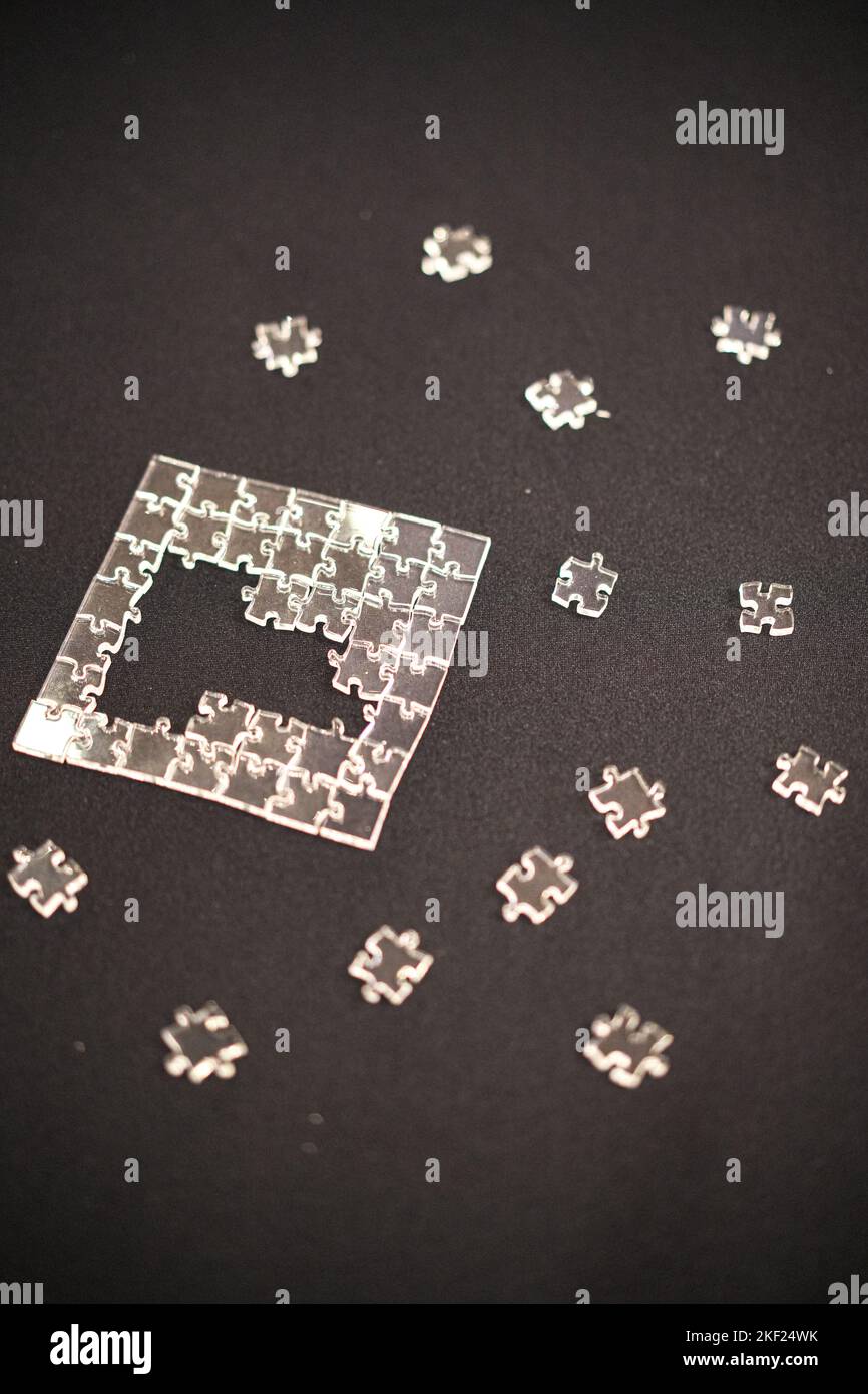 Transparent puzzle pieces hi-res stock photography and images - Alamy