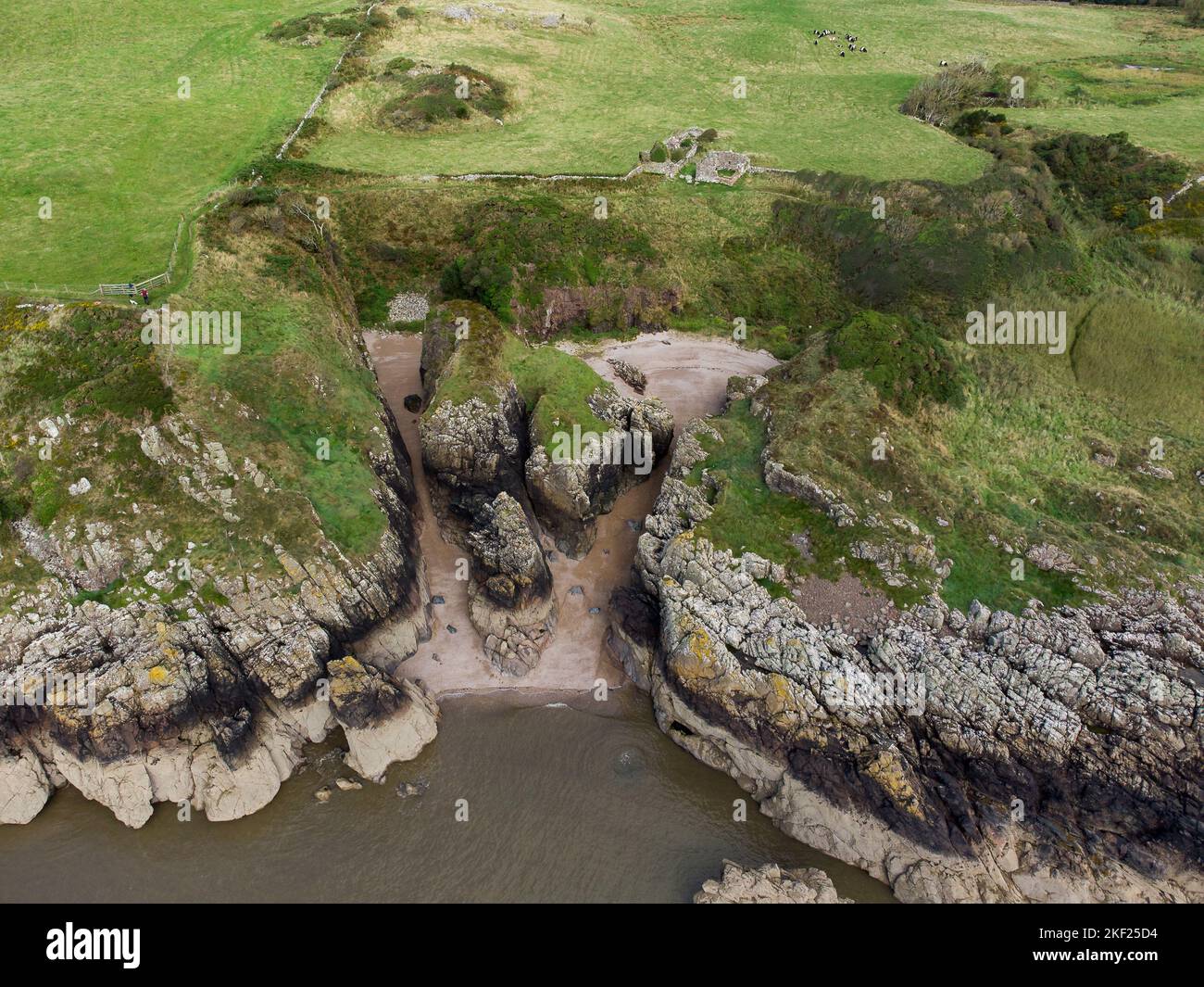 Gutchers Isle and the Boggle Hole on the Colvend Coastal Path Stock ...