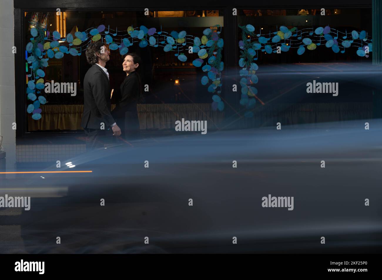 Romantic photos of a couple out for a date in a downtown urban setting ...