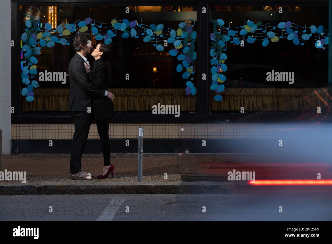 Romantic photos of a couple out for a date in a downtown urban setting ...