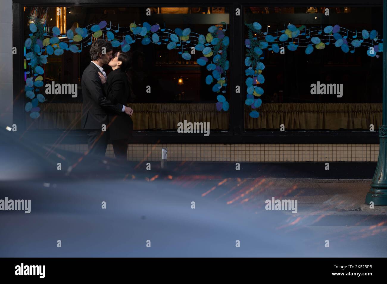 Romantic photos of a couple out for a date in a downtown urban setting ...