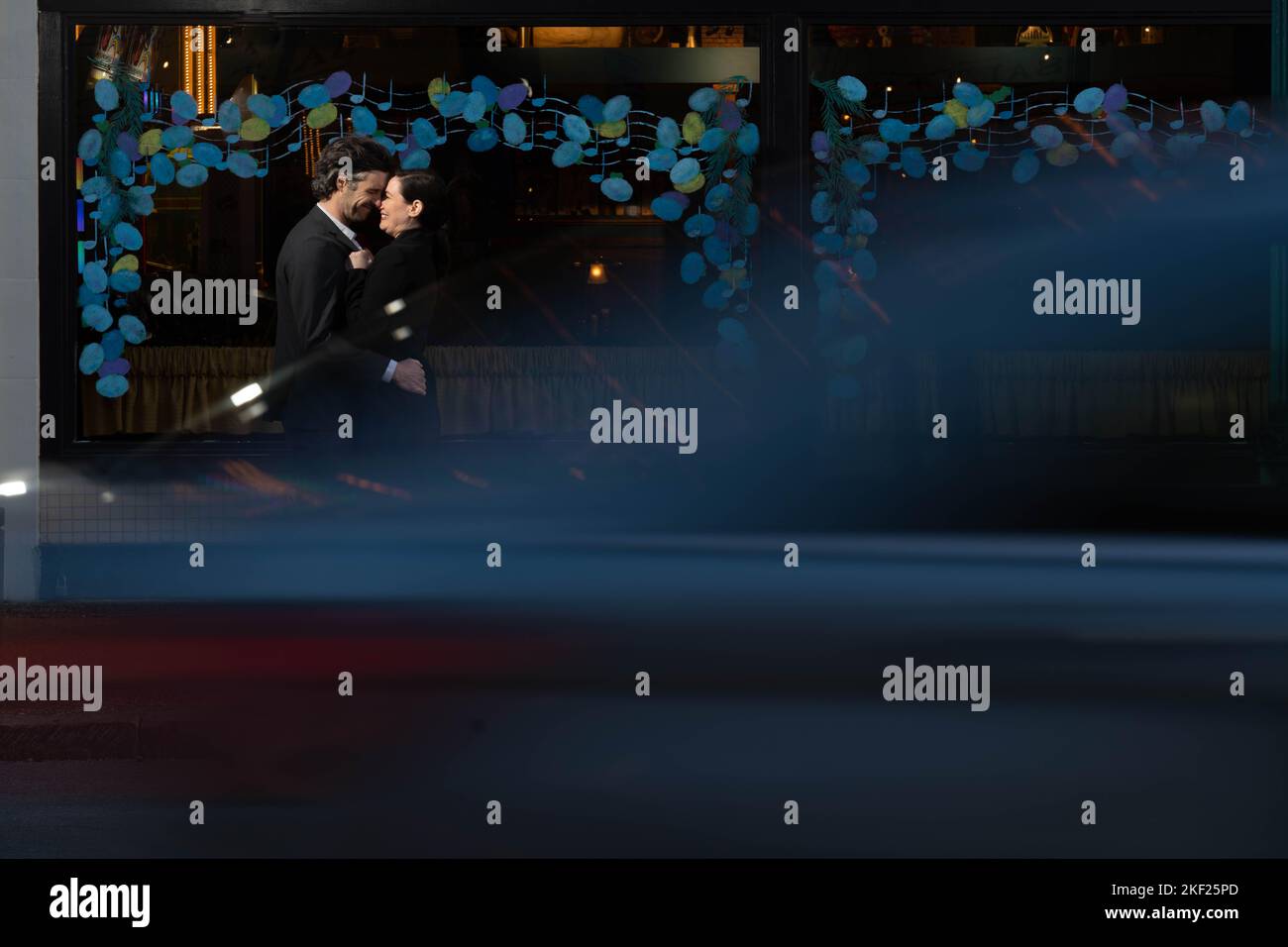 Romantic photos of a couple out for a date in a downtown urban setting ...