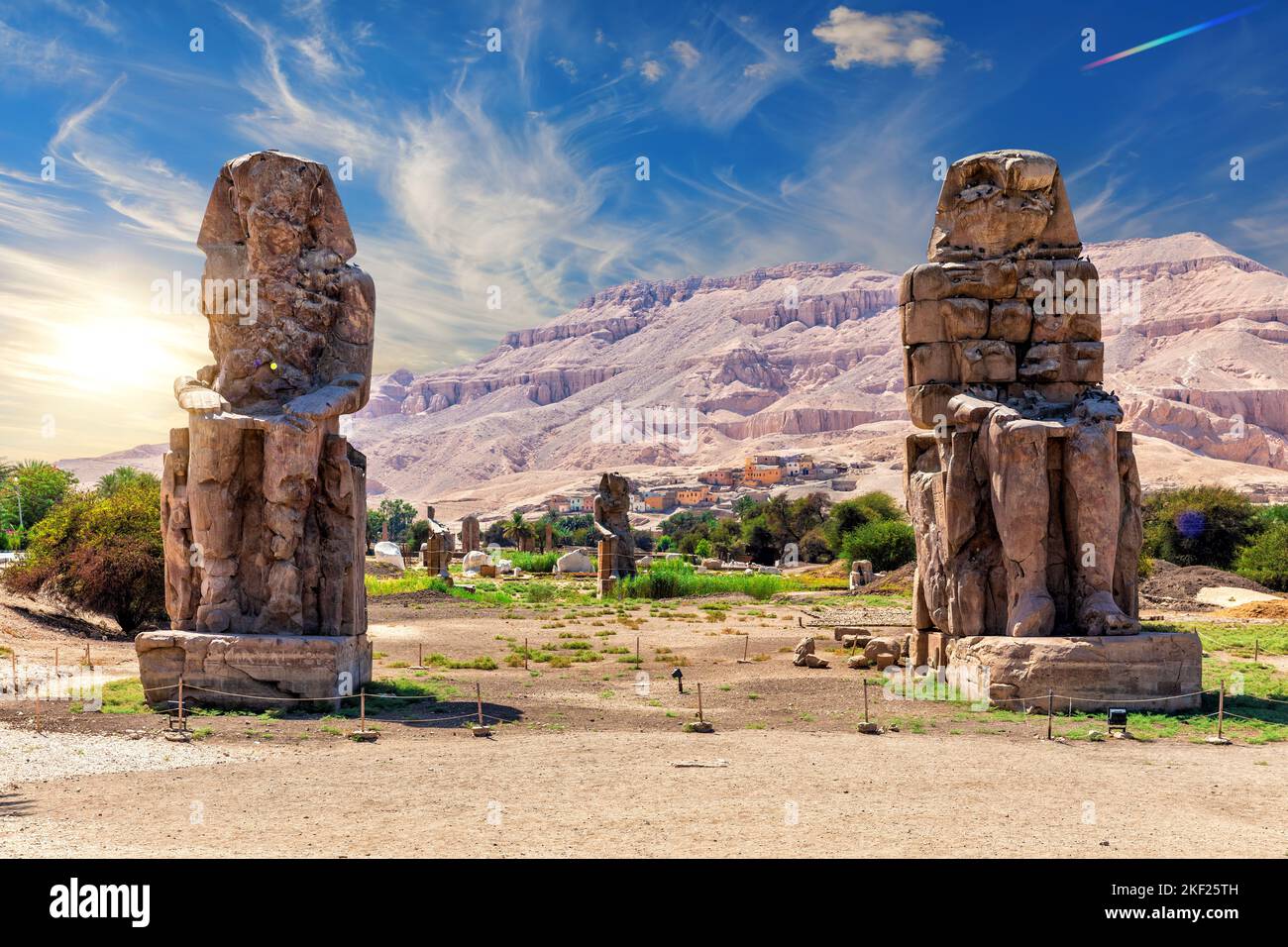 The Colossi of Memnon, famous statues of the Pharaoh Amenhotep in the ...