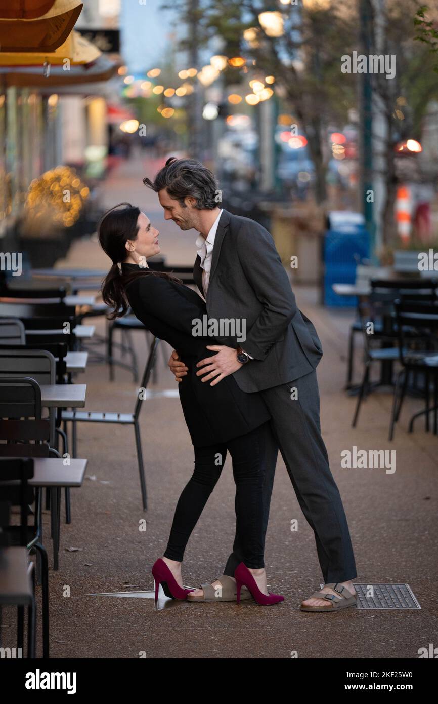 Romantic photos of a couple out for a date in a downtown urban setting ...