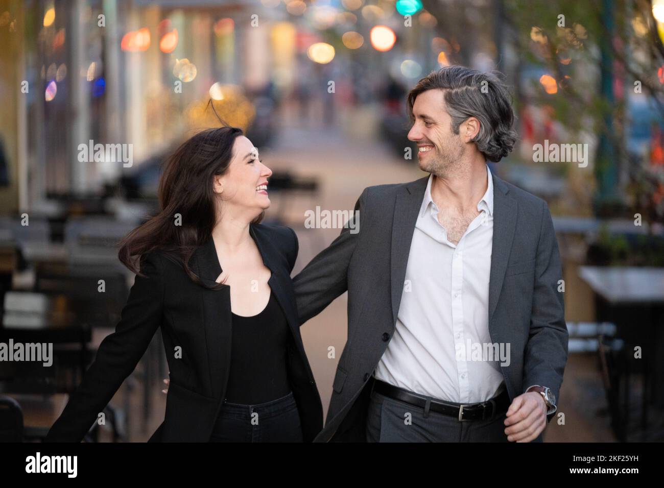 Romantic photos of a couple out for a date in a downtown urban setting ...