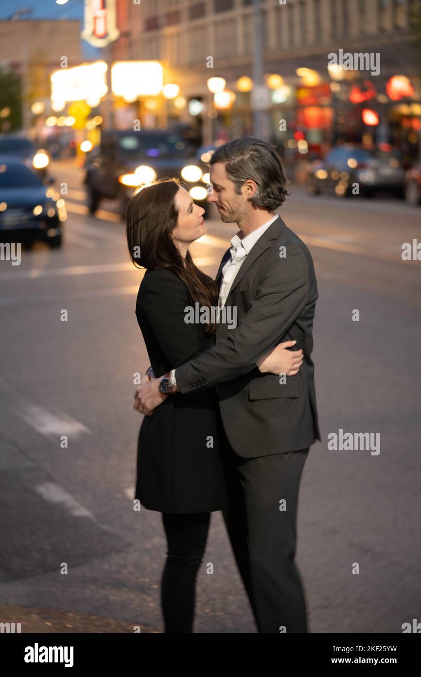 Romantic photos of a couple out for a date in a downtown urban setting ...