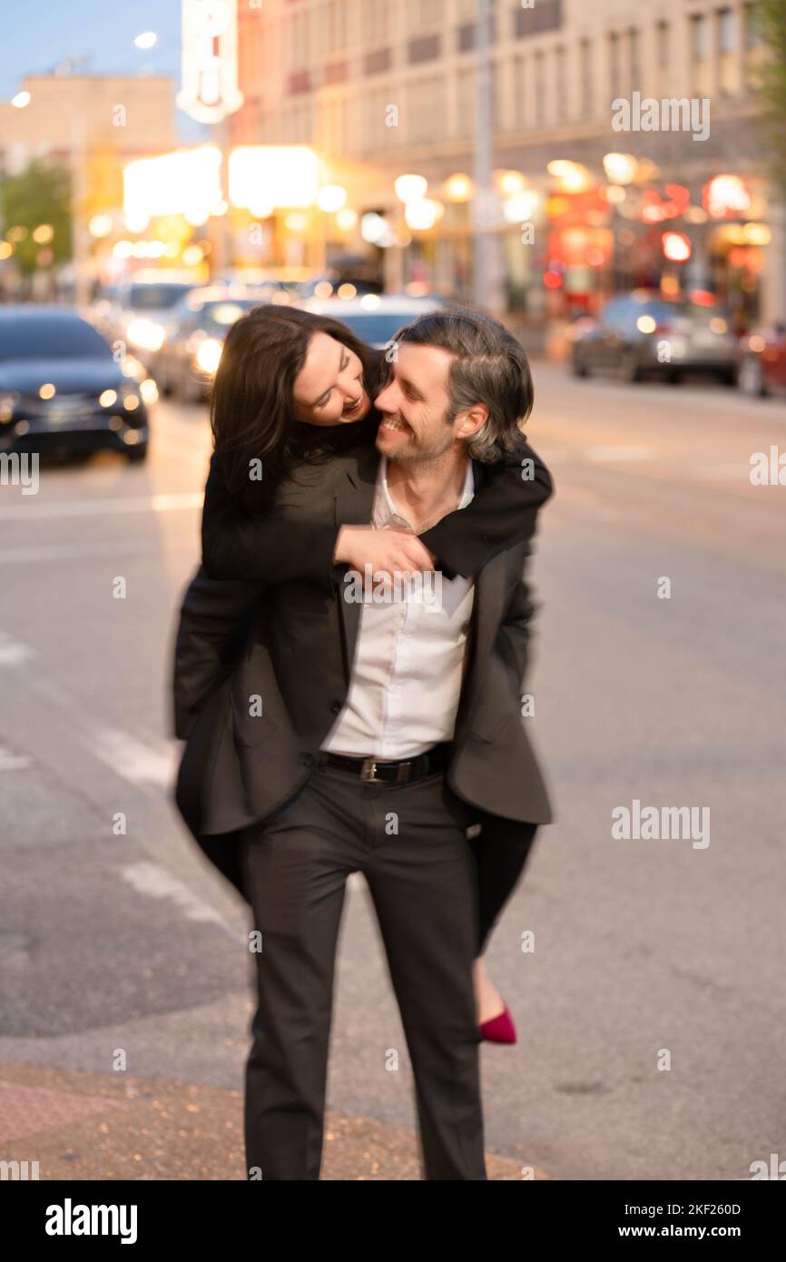 Romantic photos of a couple out for a date in a downtown urban setting ...