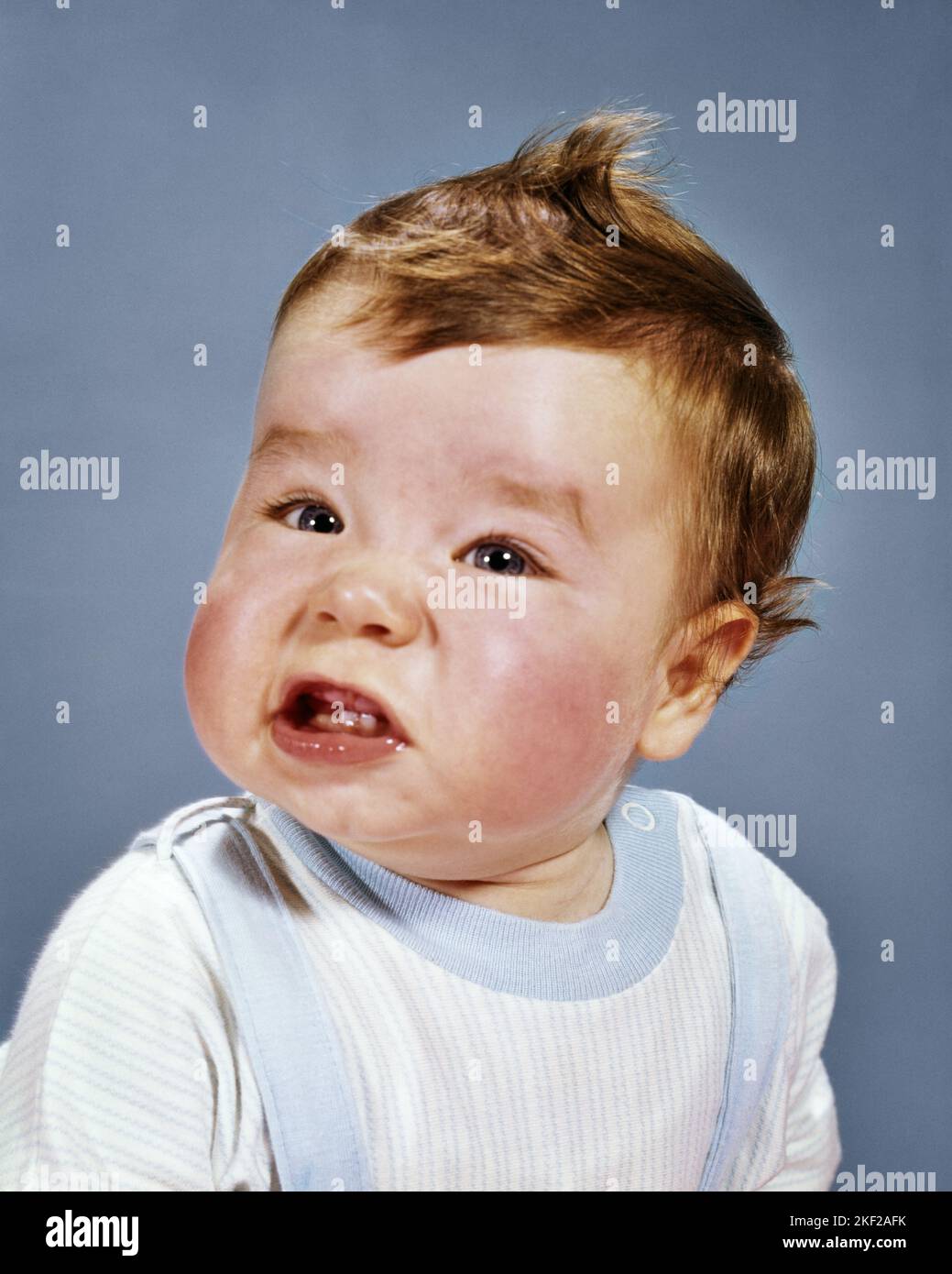1960s BABY BOY MAKING FUNNY FACE EXPRESSION LOOKING AT CAMERA - kb4692 ...