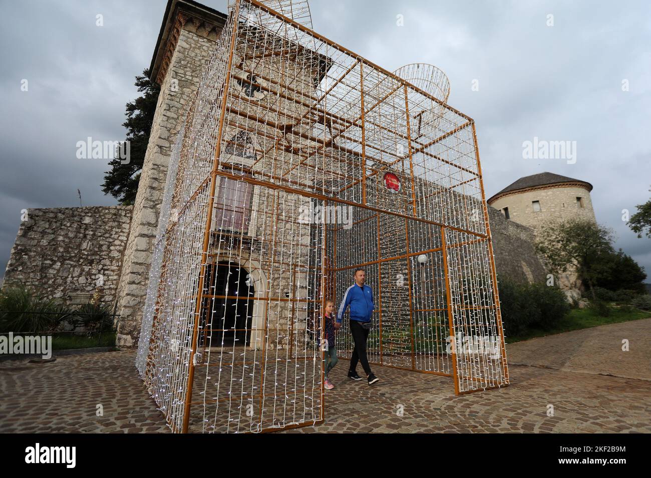 Trsat castle is decorated with lights and Christmas decorations for the ...