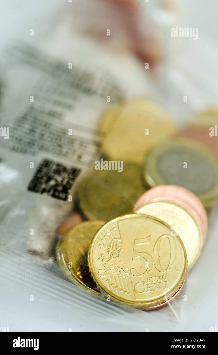 The initial package of euro coins in a plastic bag can be seen in the ...