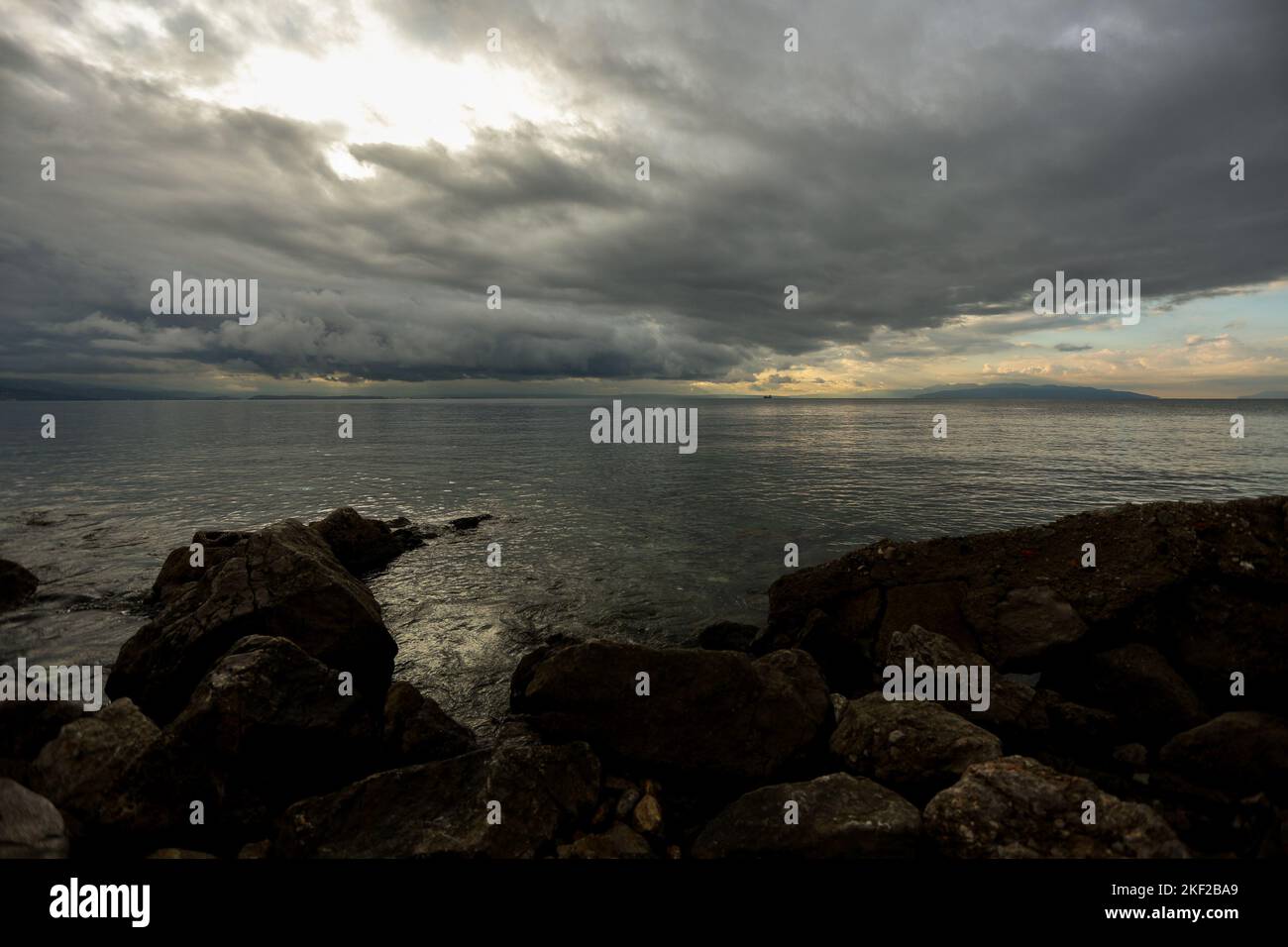 Gloomy clouds are visible over the sea. Changeable weather over Kvarner ...