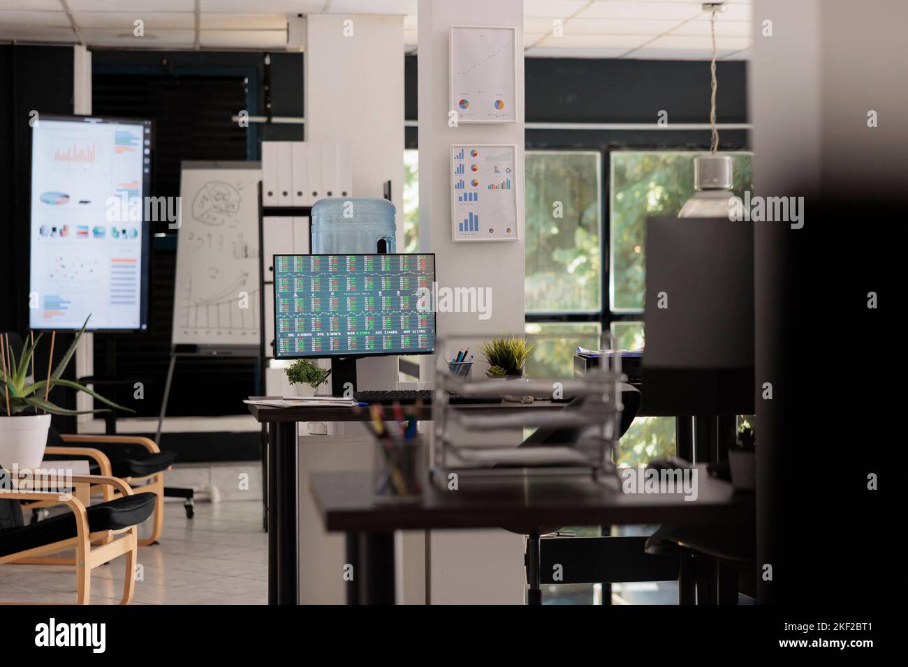 Interior of an empty stock exchange workspace with screen computer ...