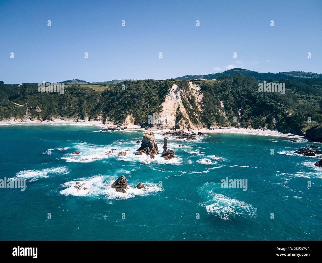 large rocks and stones of the Cantabrian sea coast with the waves ...