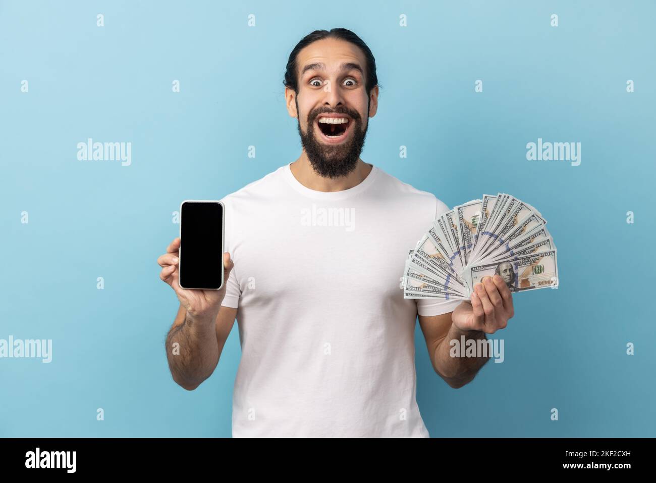 Black man transaction mobile phone hi-res stock photography and images ...