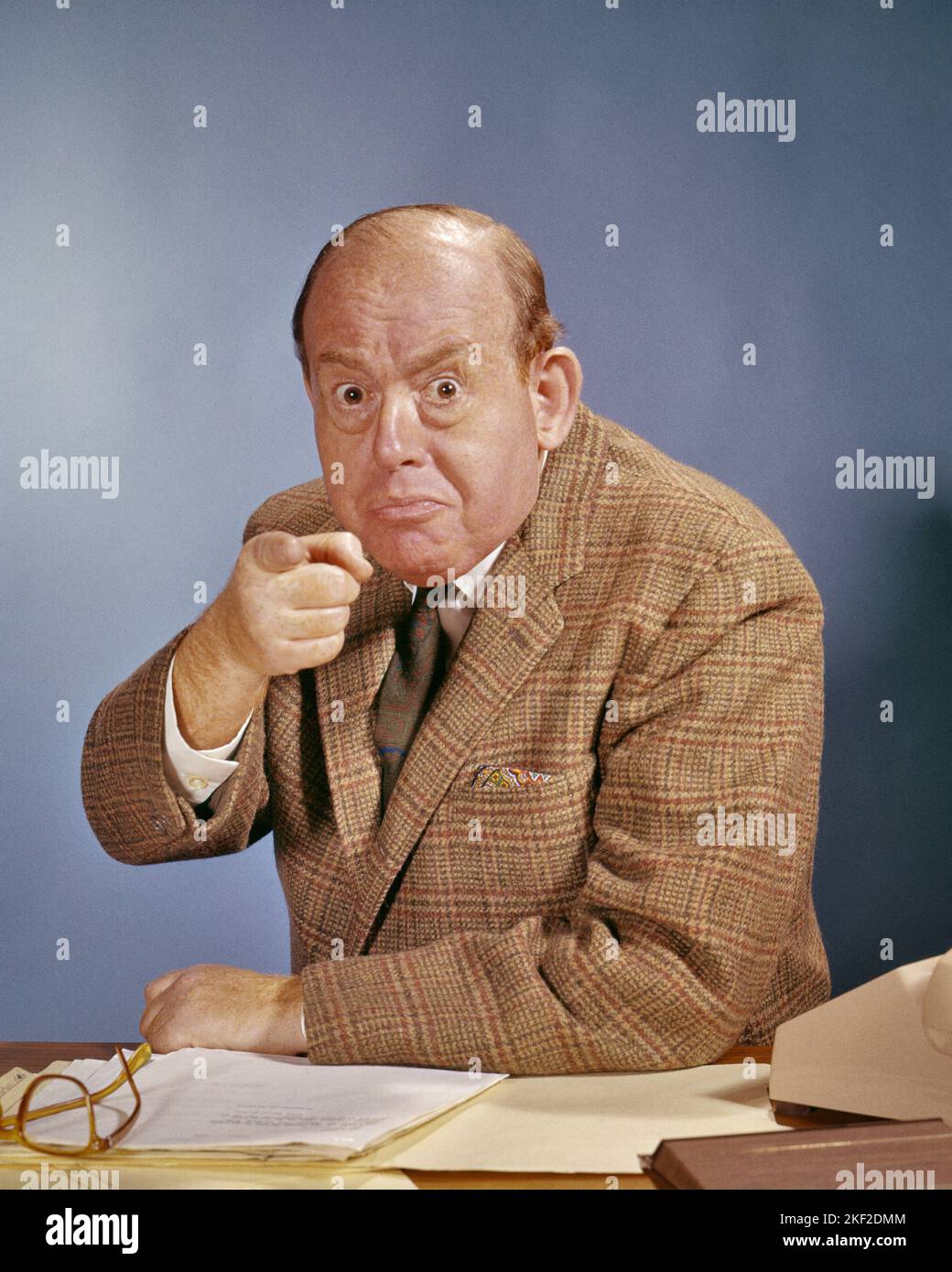 1950s 1960s ANGRY BUSINESSMAN IN SUIT AND TIE BULGING STARING EYES WIDE ...