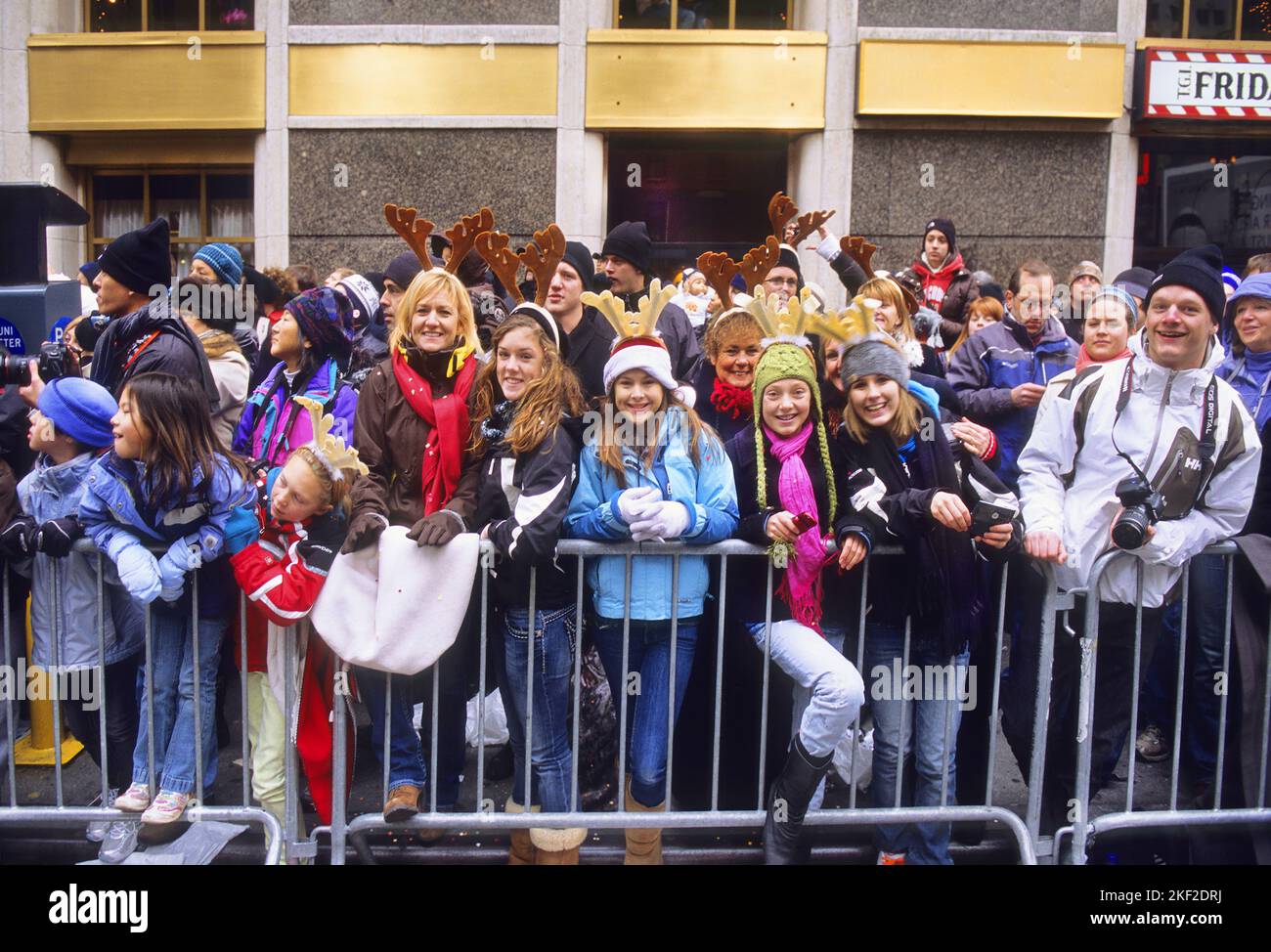 Holiday crowd on city street in New York City. Happy smiling group of ...